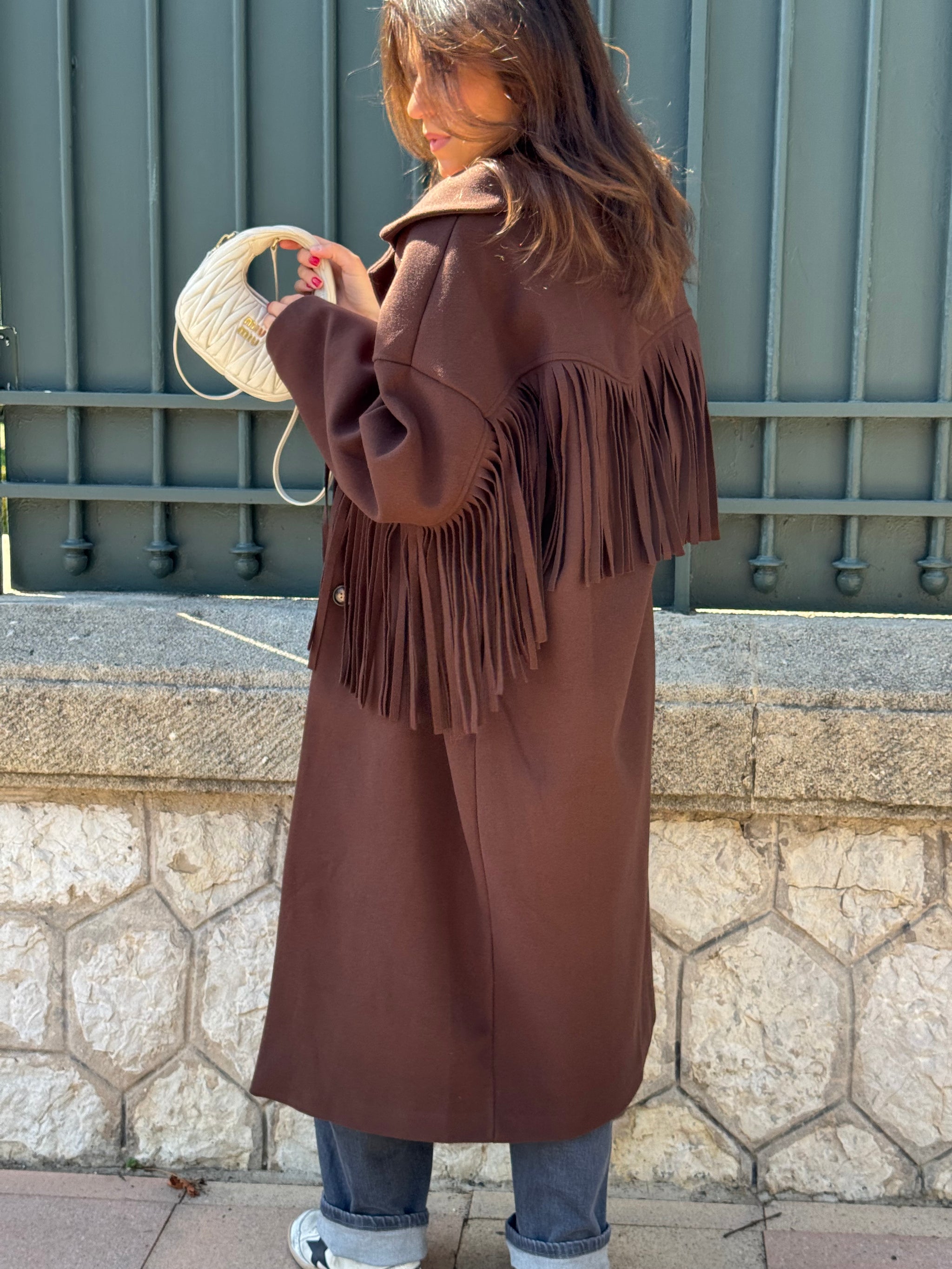 Long brown fringed coat